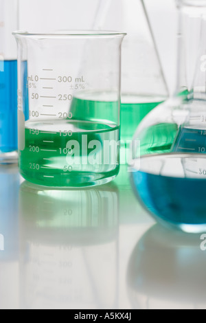 Close up of beakers with liquid Stock Photo - Alamy