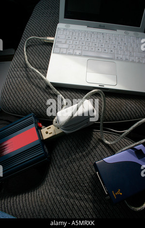 Computer peripherals and laptop accessories on white wooden background ...