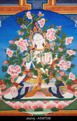 Portrait of White Tara or Dolma female Buddha on Tibetan tangka ...