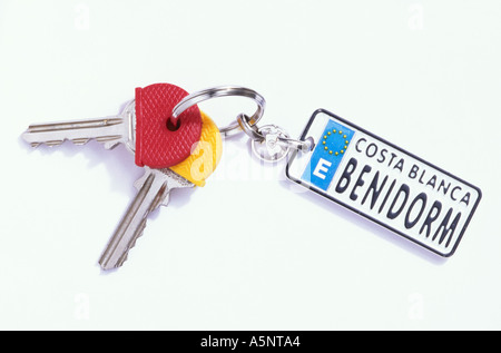 Keys on a red and yellow Spanish key ring Stock Photo - Alamy