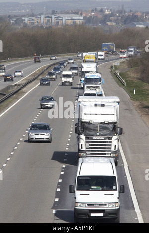 M1 Motorway traffic congestion lines of cars stuck in a traffic jam ...