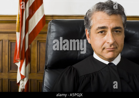 Portrait of a male judge smiling Stock Photo - Alamy