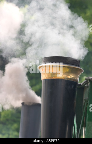 Smoking traction engine smoke stacks stack chimneys chimney at a Stock ...