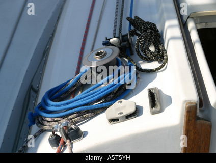 Capstan with sailboat rigging Stock Photo - Alamy