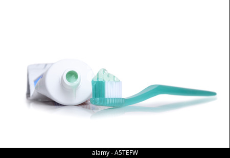 Toothbrush and toothpaste on white background Stock Photo - Alamy