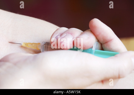 drug user injecting vein in arm Stock Photo - Alamy