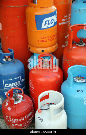Red and blue propane and butane calor gas containers Stock Photo - Alamy