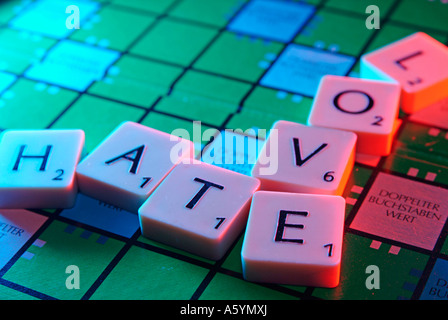 connected words hate and love built with scrabble stones Stock Photo ...