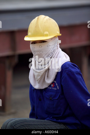 Female worker engineer in uniform is near solar panels Stock Photo - Alamy