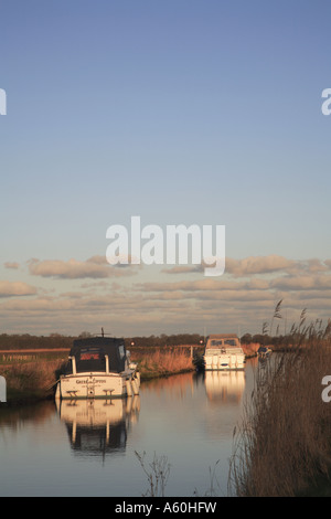 Boats moored in Upton Dyke with mooring facilities and launching ramp ...