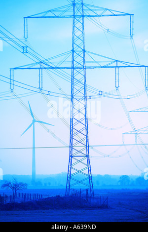 Wind turbine and electricity pylon in Germany Stock Photo - Alamy