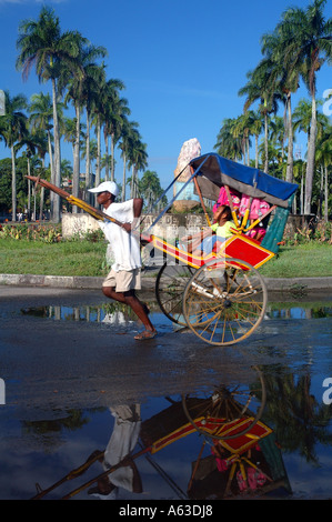 Pousse-pousse driver, Tamatave, Madagascar Stock Photo - Alamy