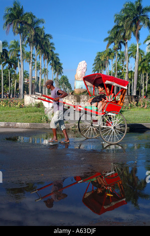 Pousse-pousse driver, Tamatave, Madagascar Stock Photo - Alamy