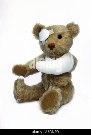 Teddy Bear with Injured Arm Stock Photo - Alamy