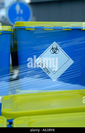 biohazard sign on blue containers Stock Photo - Alamy