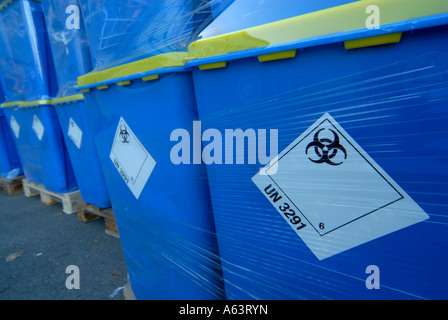biohazard sign on blue containers Stock Photo - Alamy