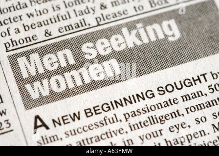 Singles ad in dating pages of newspaper Stock Photo - Alamy