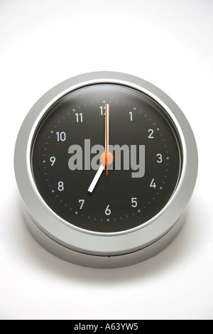 seven minutes to midnight on clock isolated on white background Stock ...