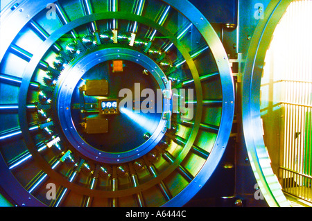 heavy steel round vault door in bank with US dollar pyramid symbol ...