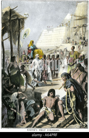 Israelite slaves building pyramids in ancient Egypt. Hand-colored ...