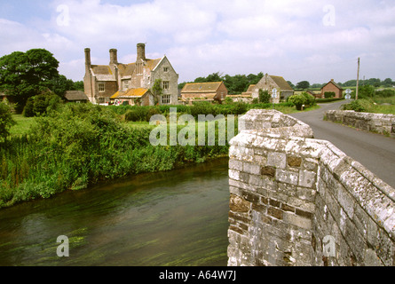 Woolbridge Manor House, Wool, Dorset and the bridge over the River ...
