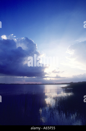 Sunset on the lake Stock Photo - Alamy