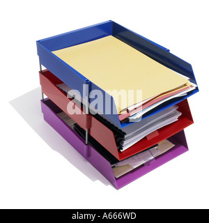Three stackable trays with paperwork Stock Photo - Alamy