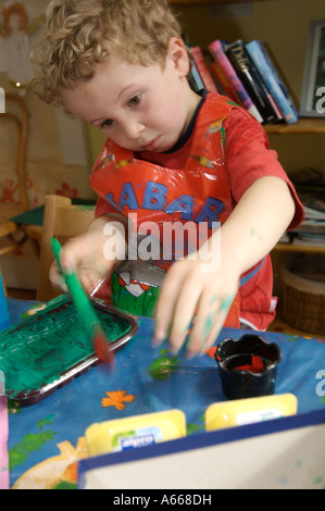 4 year old boy building rocket Stock Photo - Alamy
