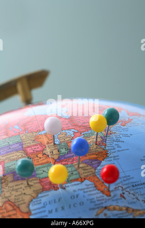 Globe with pins Stock Photo - Alamy