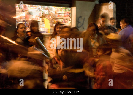 breaking the pinata - christmas game at night - mexico city Stock Photo ...