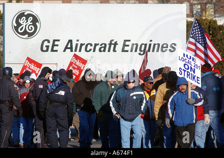 Striking General Electric Company workers picket in Lynn Massachusetts ...