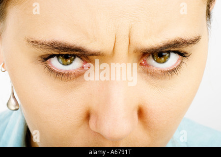 Annoyed irritated young woman with an angry face looking furious, mad ...