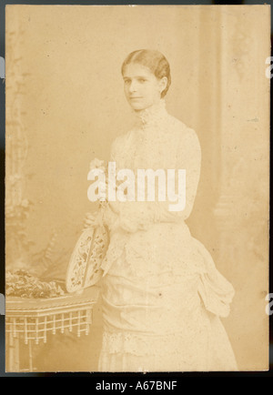Woman in a white Victorian dress in an autumn park Stock Photo - Alamy