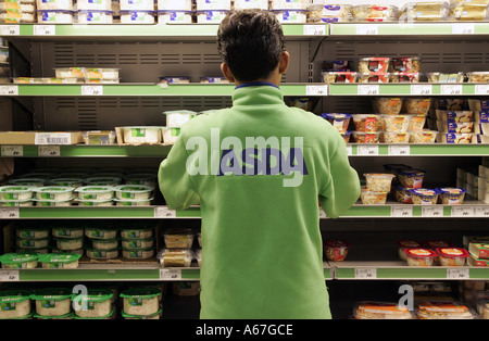 A young employee of the Asda supermarket working as an Order Picker at ...