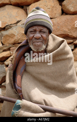 Man wrapped in basotho blanket in rural landscape, portrait, Lesotho, Africa Stock Photo - Alamy