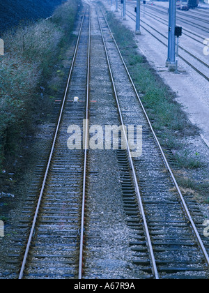Two parallel railway tracks side by side Stock Photo - Alamy