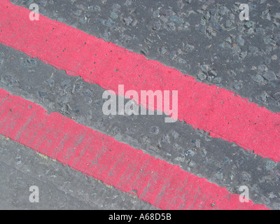 Red Route double red lines on road, UK Stock Photo - Alamy