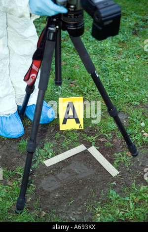 Shoe print at crime scene with forensic marker Stock Photo: 10180979 ...