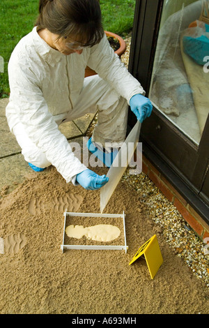 Shoe print at crime scene with forensic marker Stock Photo - Alamy