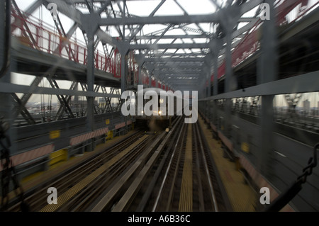 Williamsburg Subway bridge grid metal pillars commuters train station metro NY struts horizontal ...
