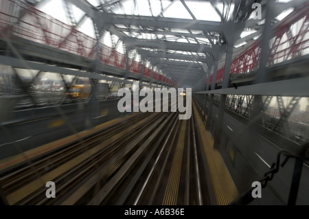 Williamsburg Subway bridge grid metal pillars commuters train station metro NY struts horizontal ...