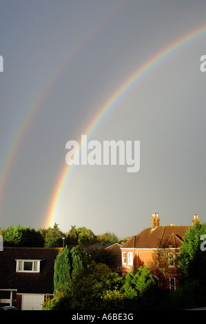 Rainbow over suburbia Stock Photo - Alamy