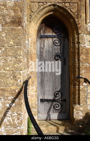 An old decorative heavy wooden door in a stone building Stock Photo - Alamy