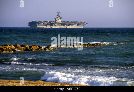 The crew of the nuclear-powered aircraft carrier USS ABRAHAM LINCOLN ...