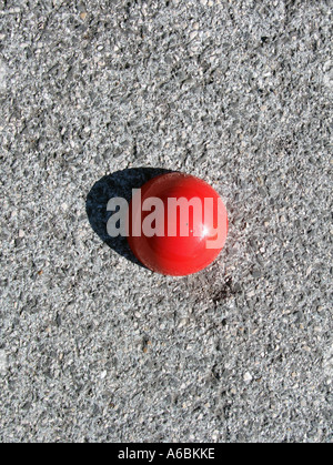 red skittle on road Stock Photo - Alamy
