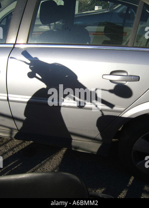 scooter shadow on car door Stock Photo - Alamy