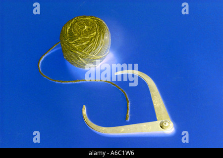 Ball of string with engineers measuring calipers Stock Photo - Alamy