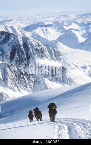 A group of climbers is tracking on the mountain range Stock Photo - Alamy