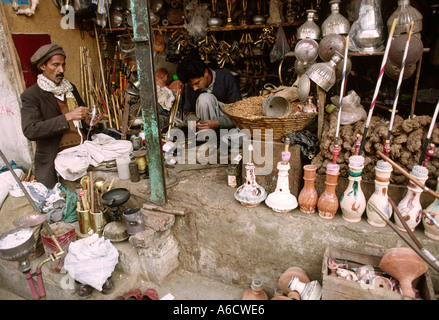 Pakistan Rawalpindi Rajah Bazaar couple at hookah pipe shop Stock Photo ...