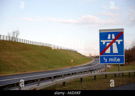 End of motorway sign Stock Photo - Alamy